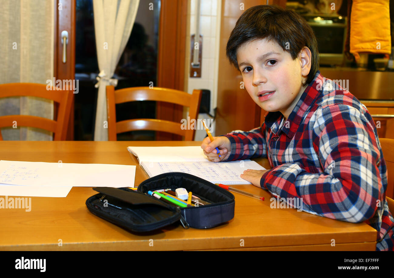 Boy writes school hi-res stock photography and images - Alamy