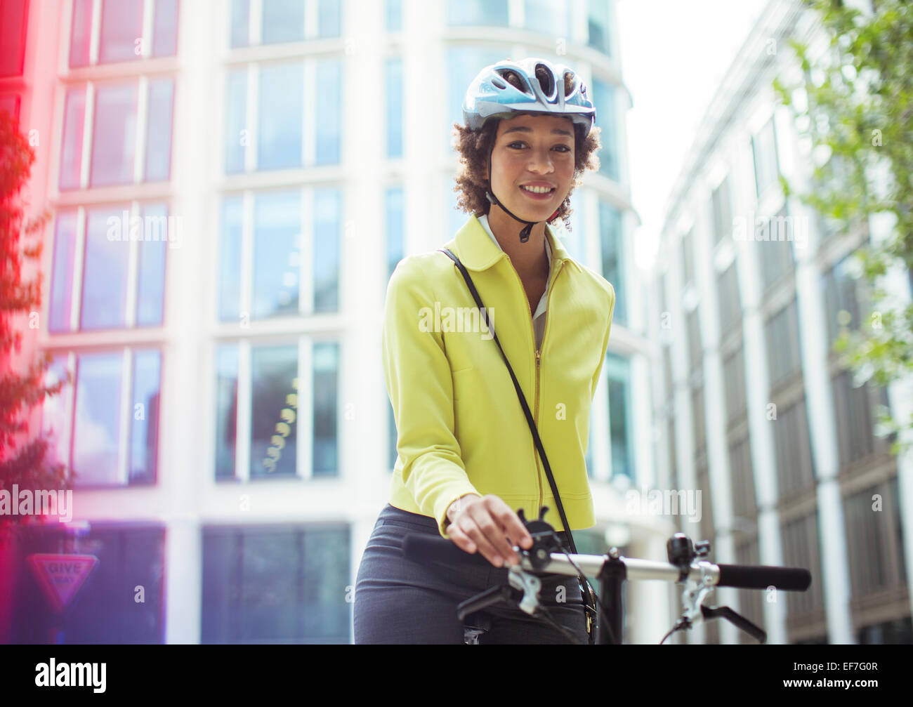 Woman pushing her bicycle hi-res stock photography and images - Alamy