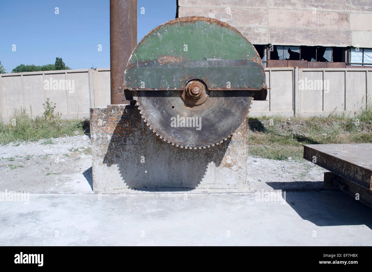 Old abandoned production for trimming stone slabs Stock Photo - Alamy