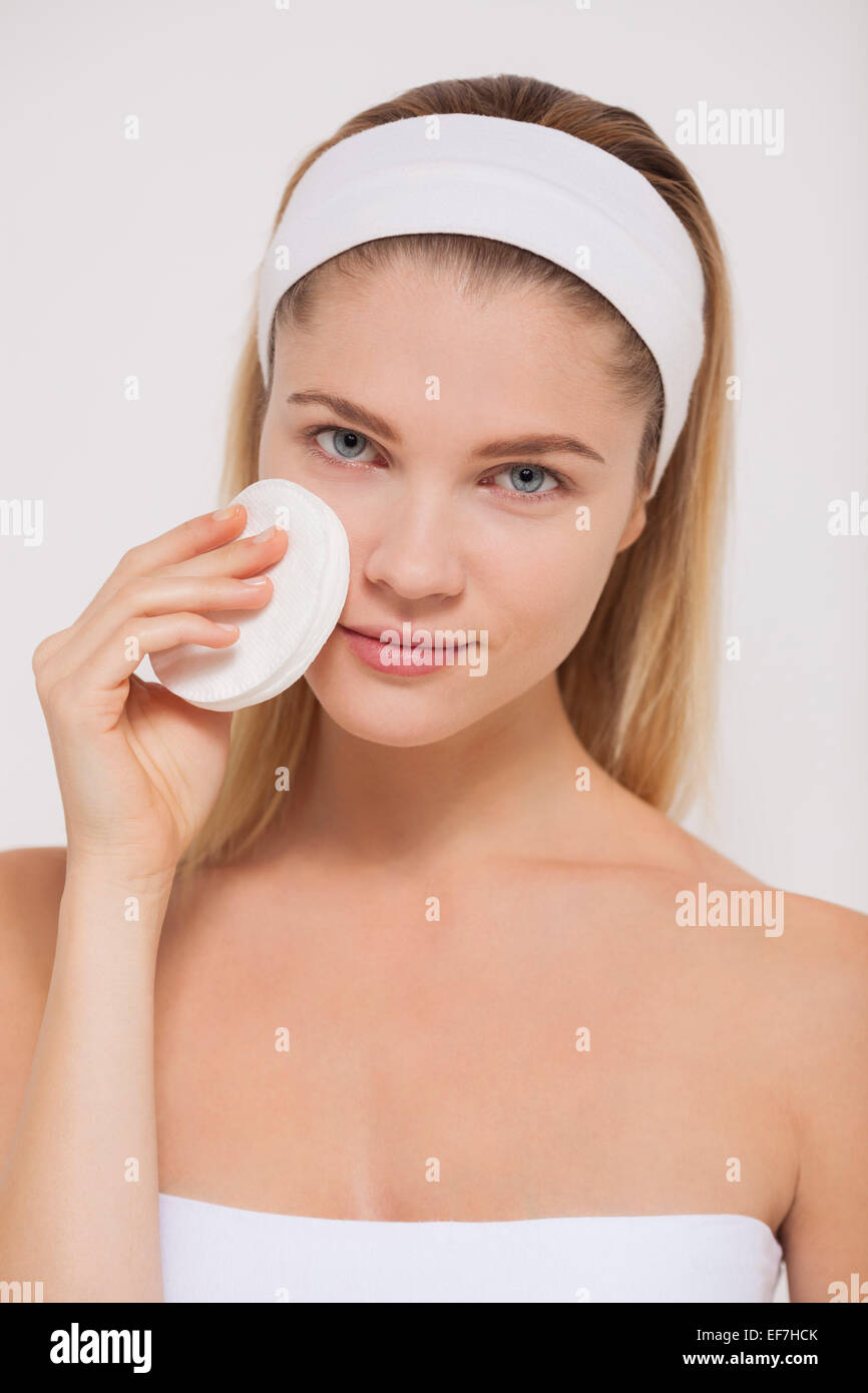 Woman cleaning face hi-res stock photography and images - Alamy