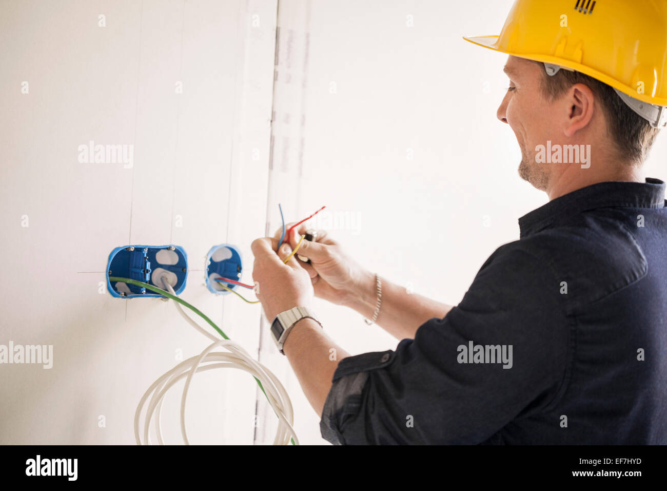 Electrician working hi-res stock photography and images - Alamy