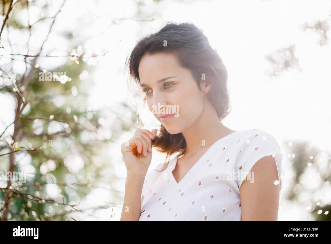 Close-up of a beautiful woman thinking Stock Photo - Alamy