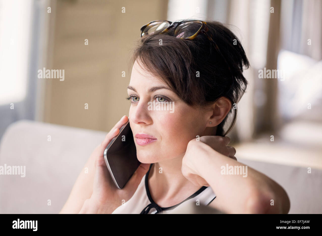 Beautiful woman holding cell hi-res stock photography and images - Alamy
