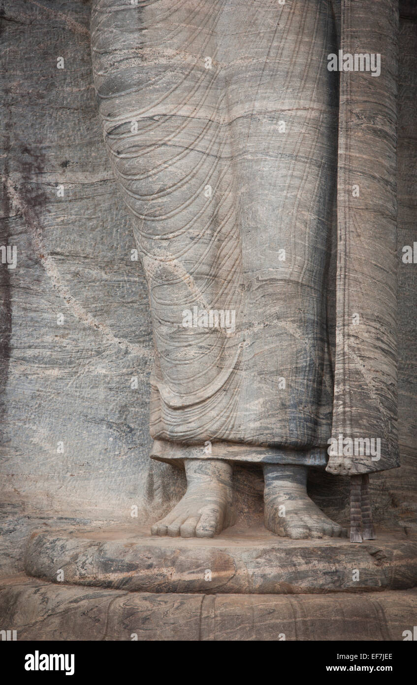 GIANT BUDDHA STATUE ON LOTUS PLINTH; GAL VIHARA ROCK TEMPLE Stock Photo ...
