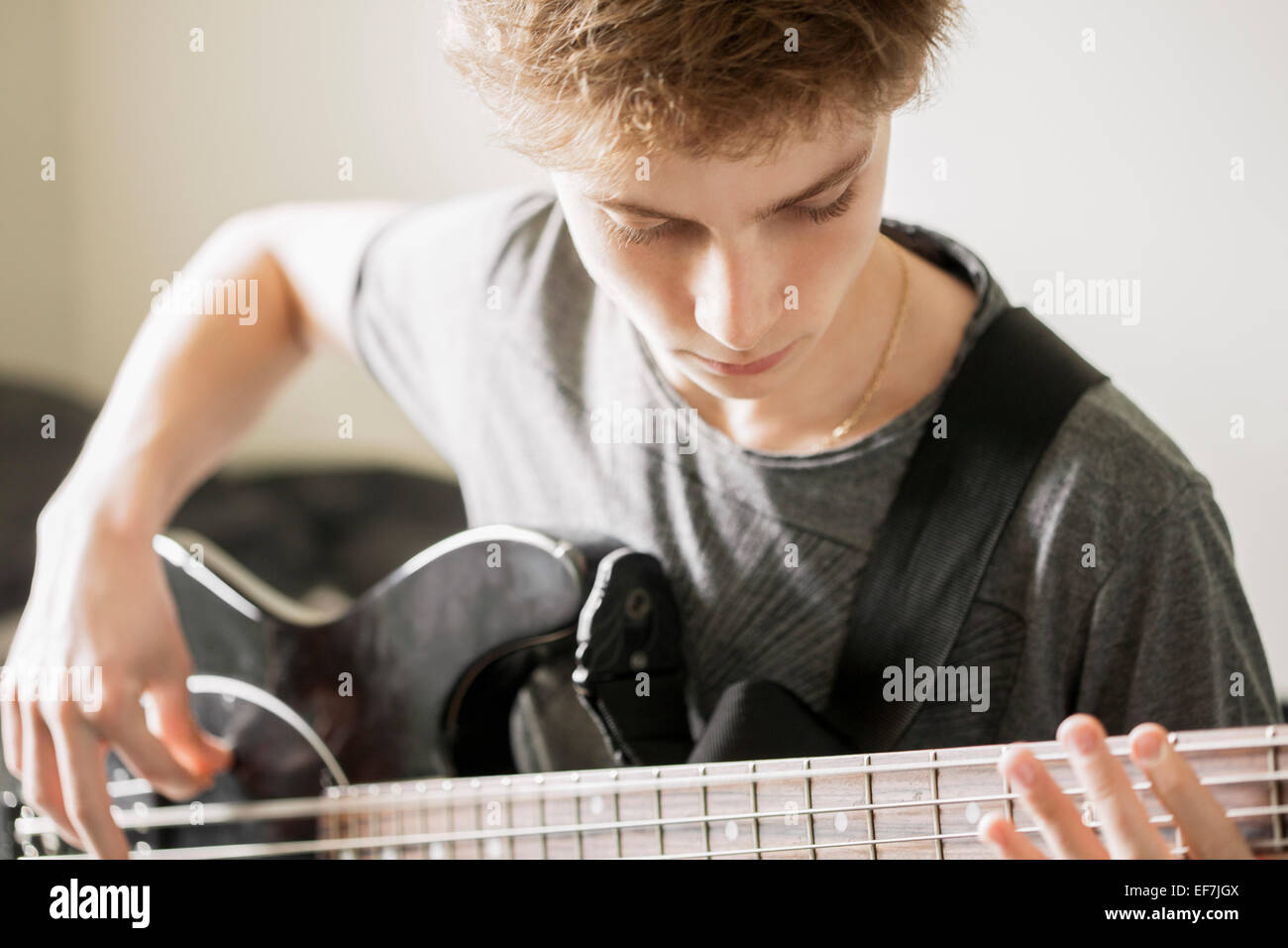 Boy Playing Electric Guitar High Resolution Stock Photography and ...