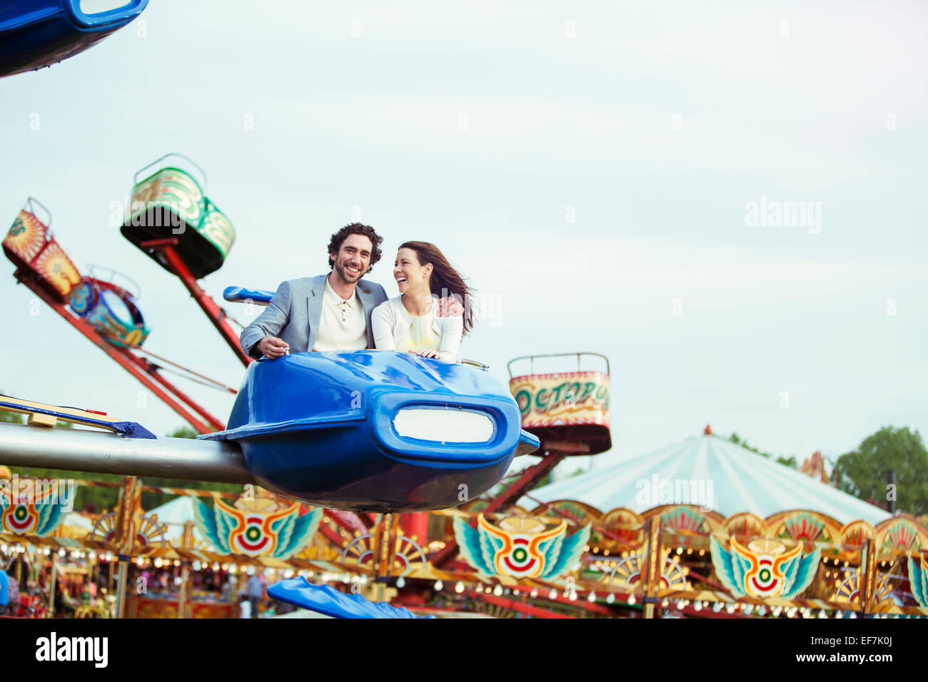 Men Ride Carousel High Resolution Stock Photography and Images - Alamy