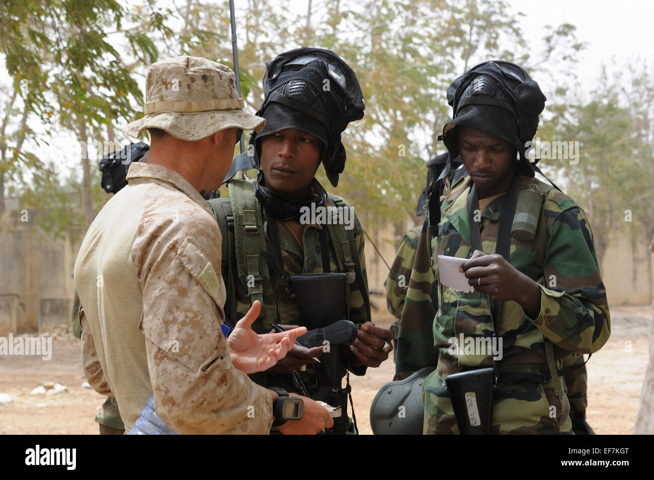 A US Marine special operations instructor briefs Senegalese and Malian ...