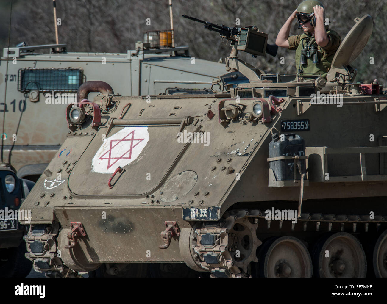 Golan Heights. 28th Jan, 2015. An Israeli soldier stands on the top of ...