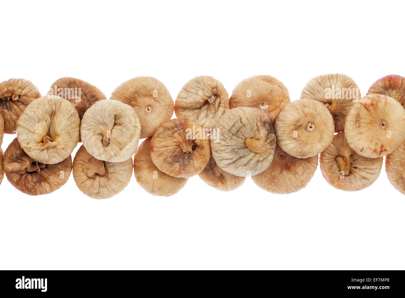 line of dried figs, isolated on white background Stock Photo - Alamy