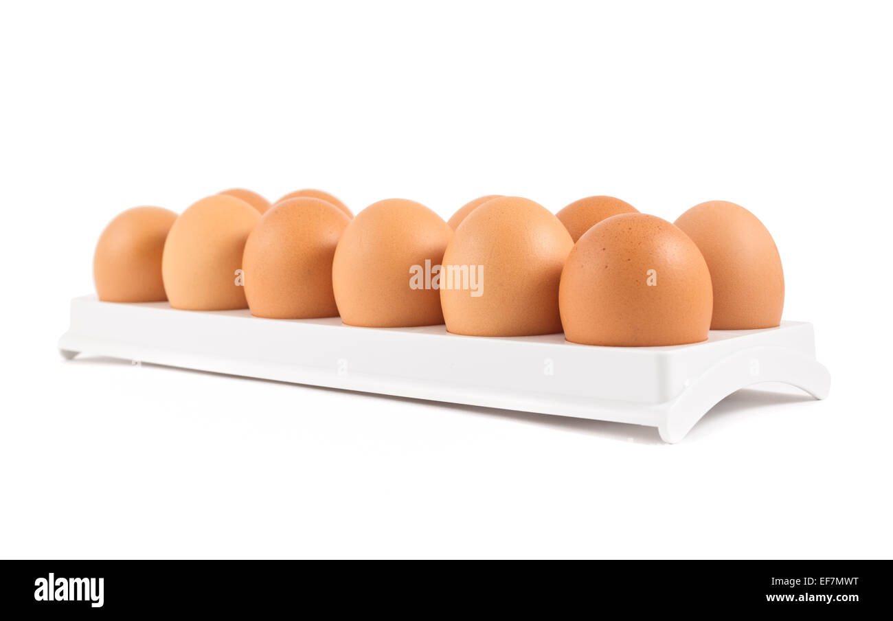Dozen of eggs in a case isolated Stock Photo - Alamy