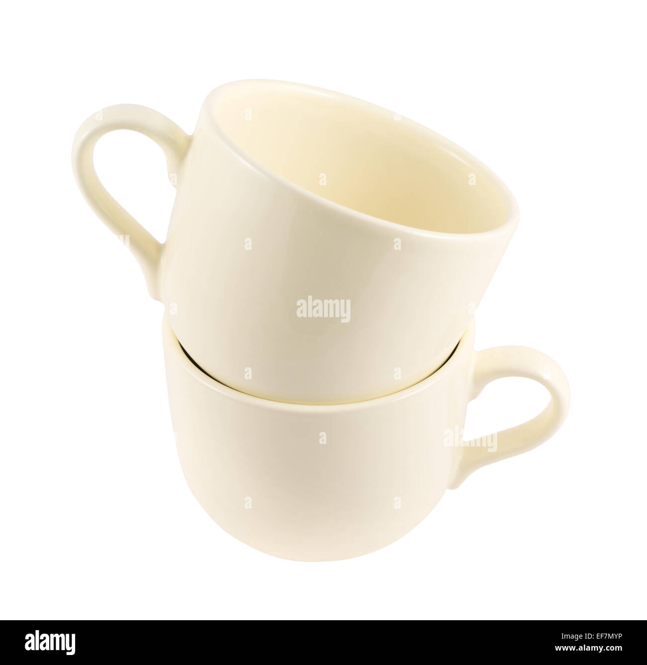 Ceramic cream colored cup pile isolated Stock Photo - Alamy