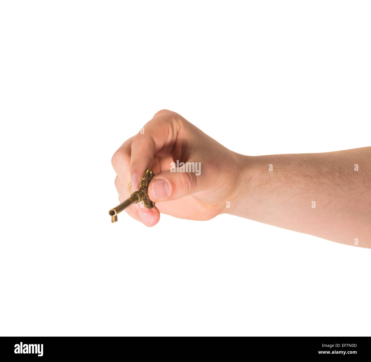 Hand holding a key isolated Stock Photo - Alamy