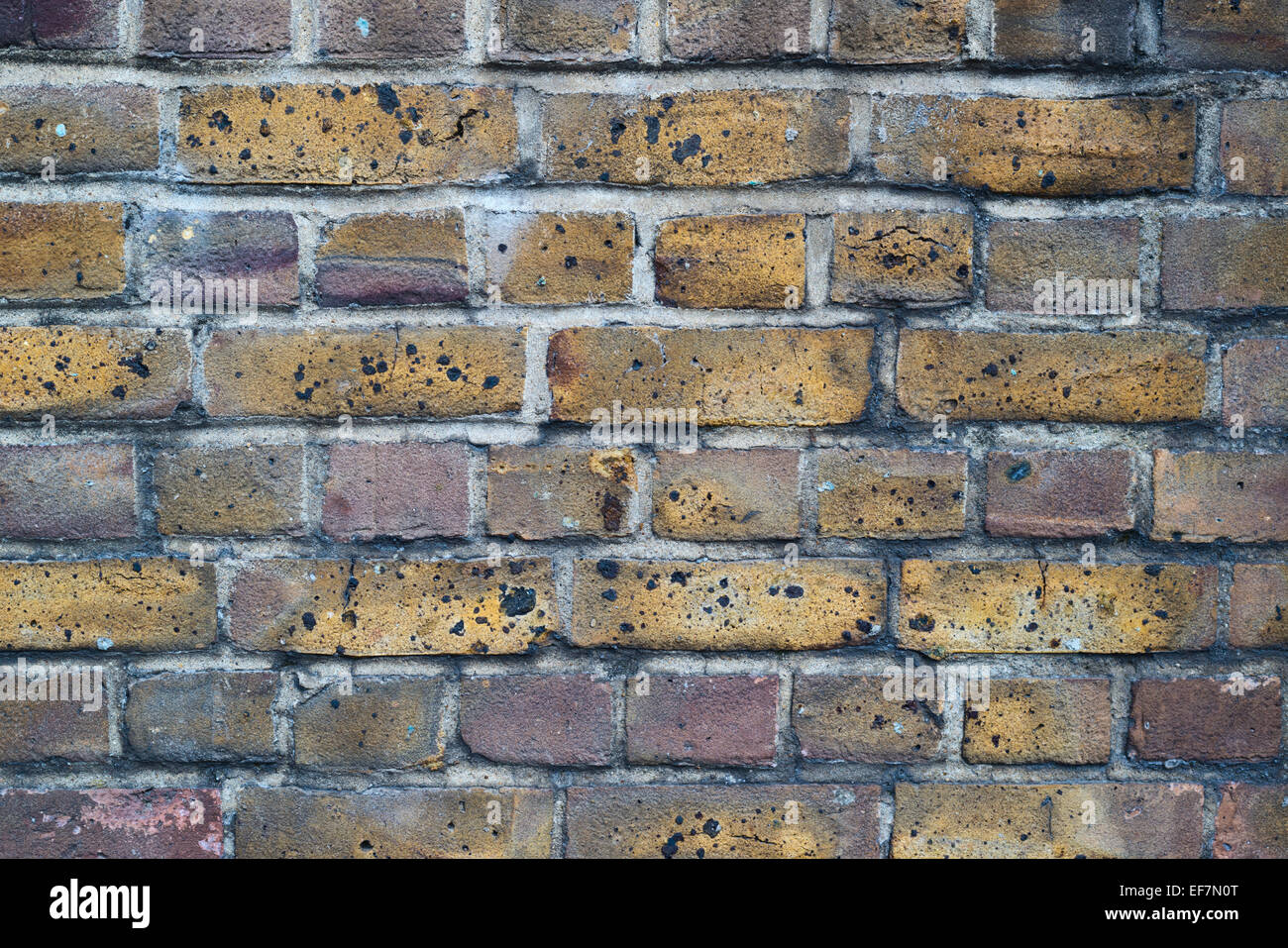 Covered with soot brick wall Stock Photo - Alamy