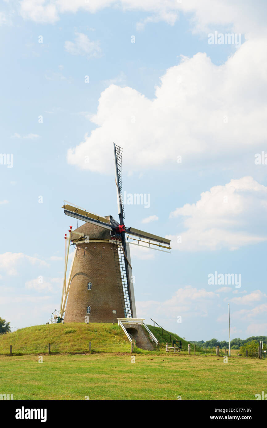 Typical Dutch windmill in landscape Stock Photo - Alamy