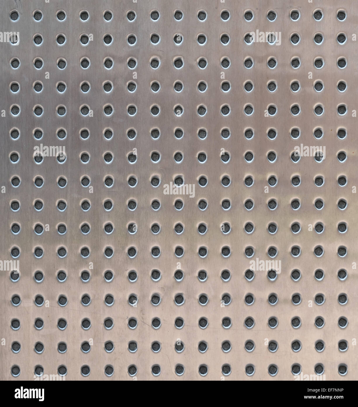 Perforated metal surface texture Stock Photo - Alamy
