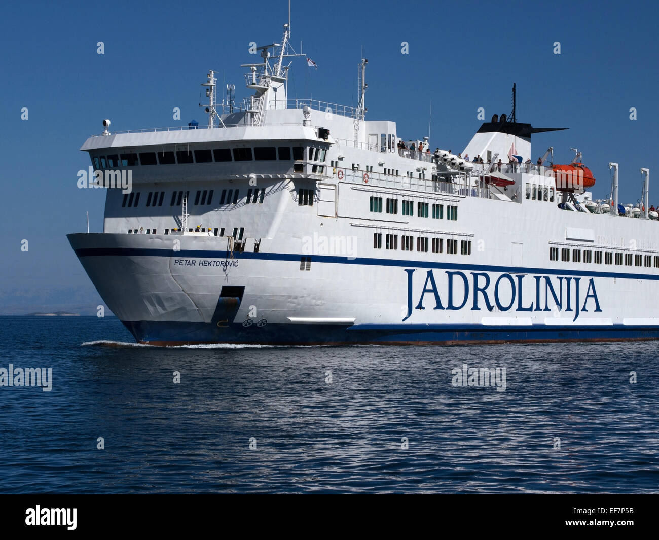 Large ferry ship on blue sea close up Stock Photo - Alamy
