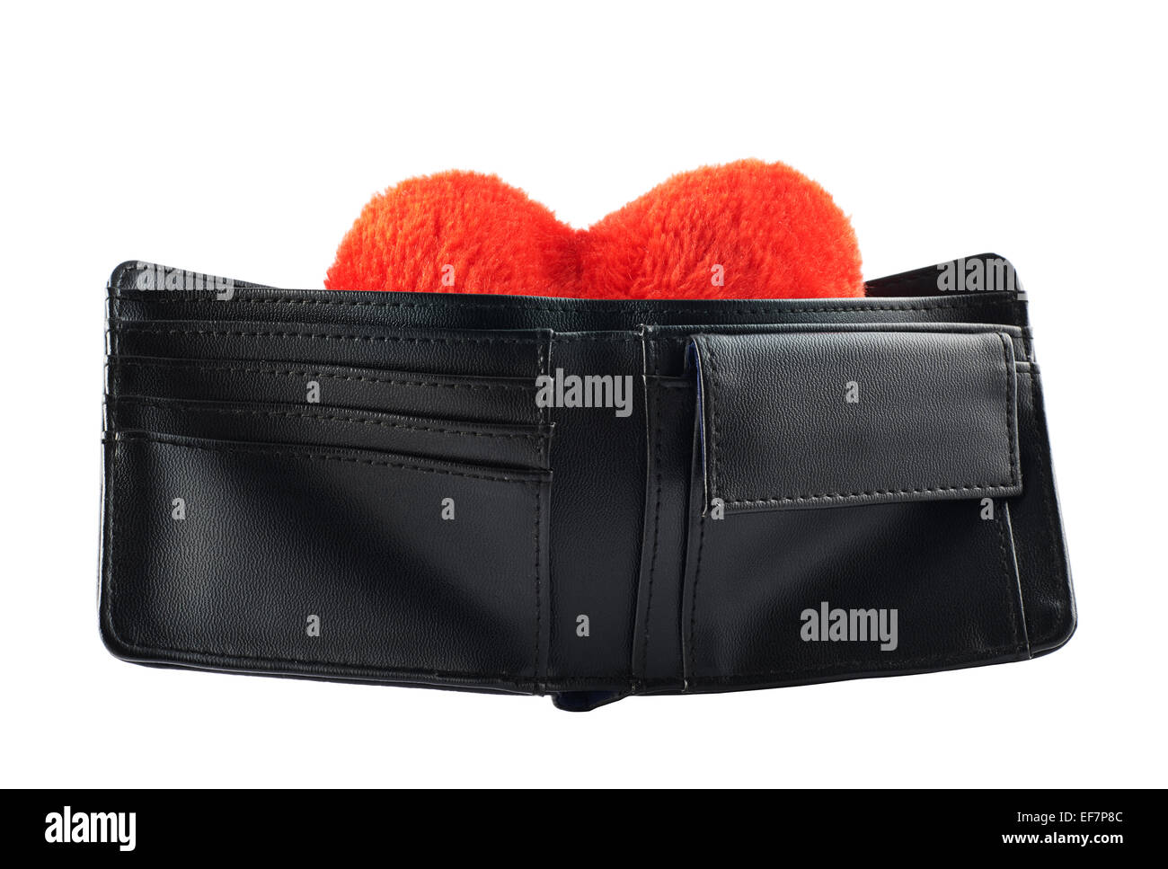 Plush heart in a wallet isolated Stock Photo - Alamy