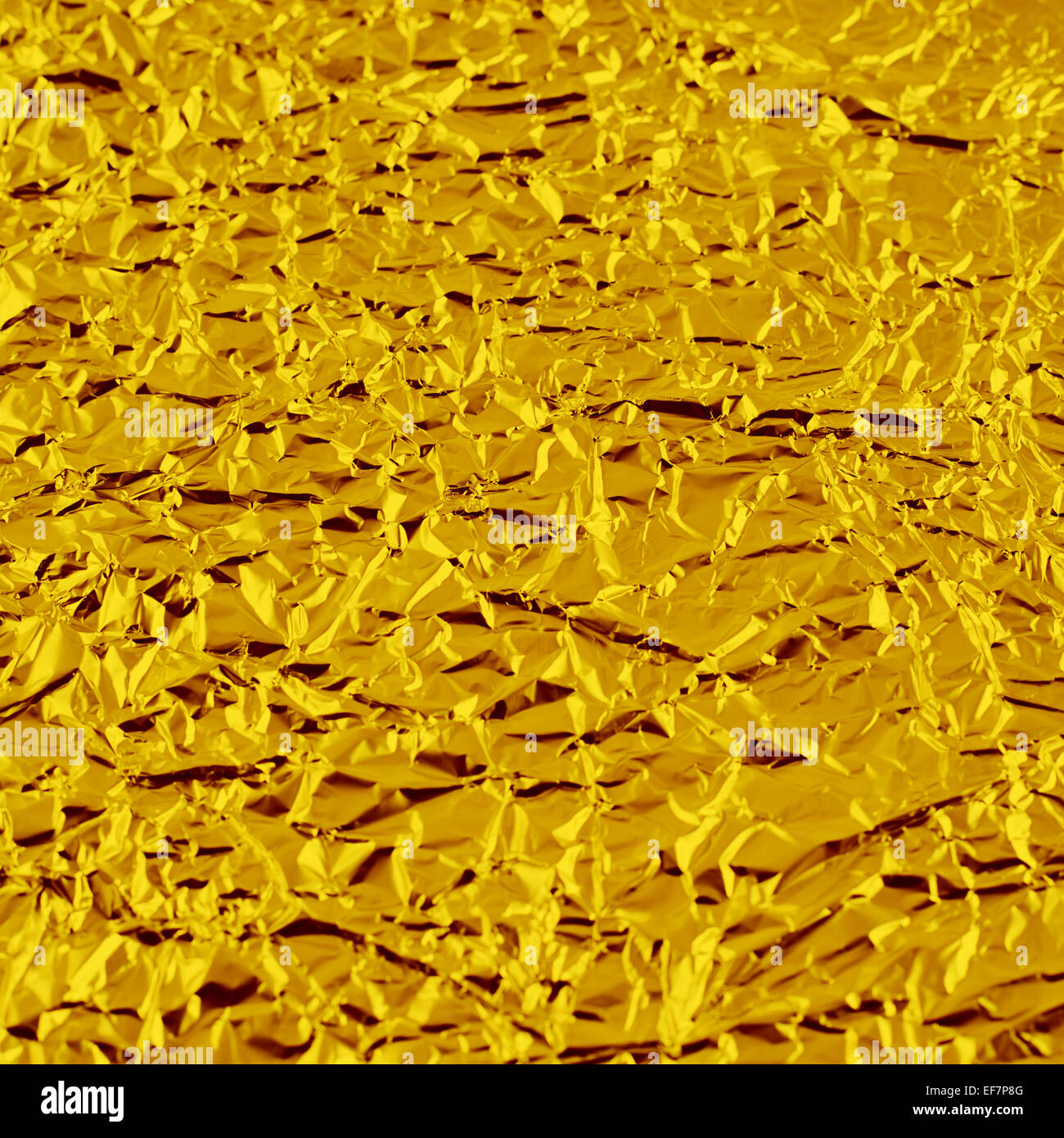Aluminum golden foil texture Stock Photo - Alamy