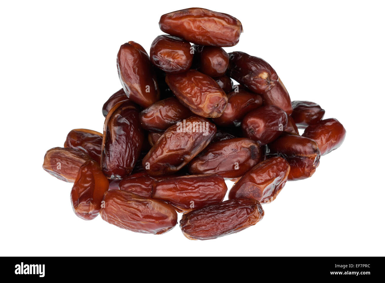 Pile of dried dates, isolated on white background Stock Photo - Alamy