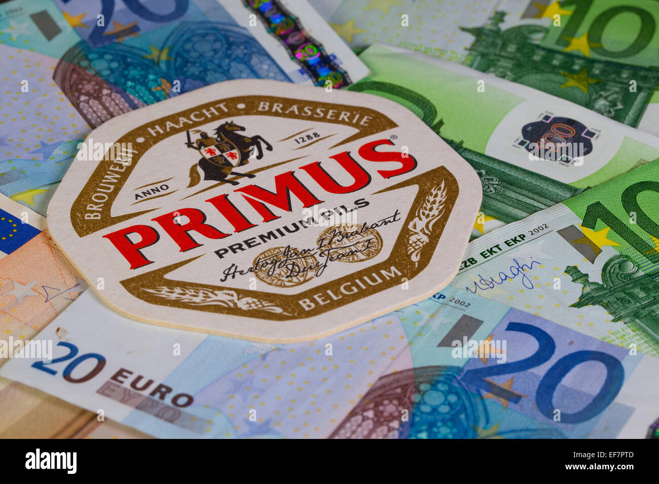 Berlin,Germany-January 12,2015: Beermat from Primus beer and EUR money ...