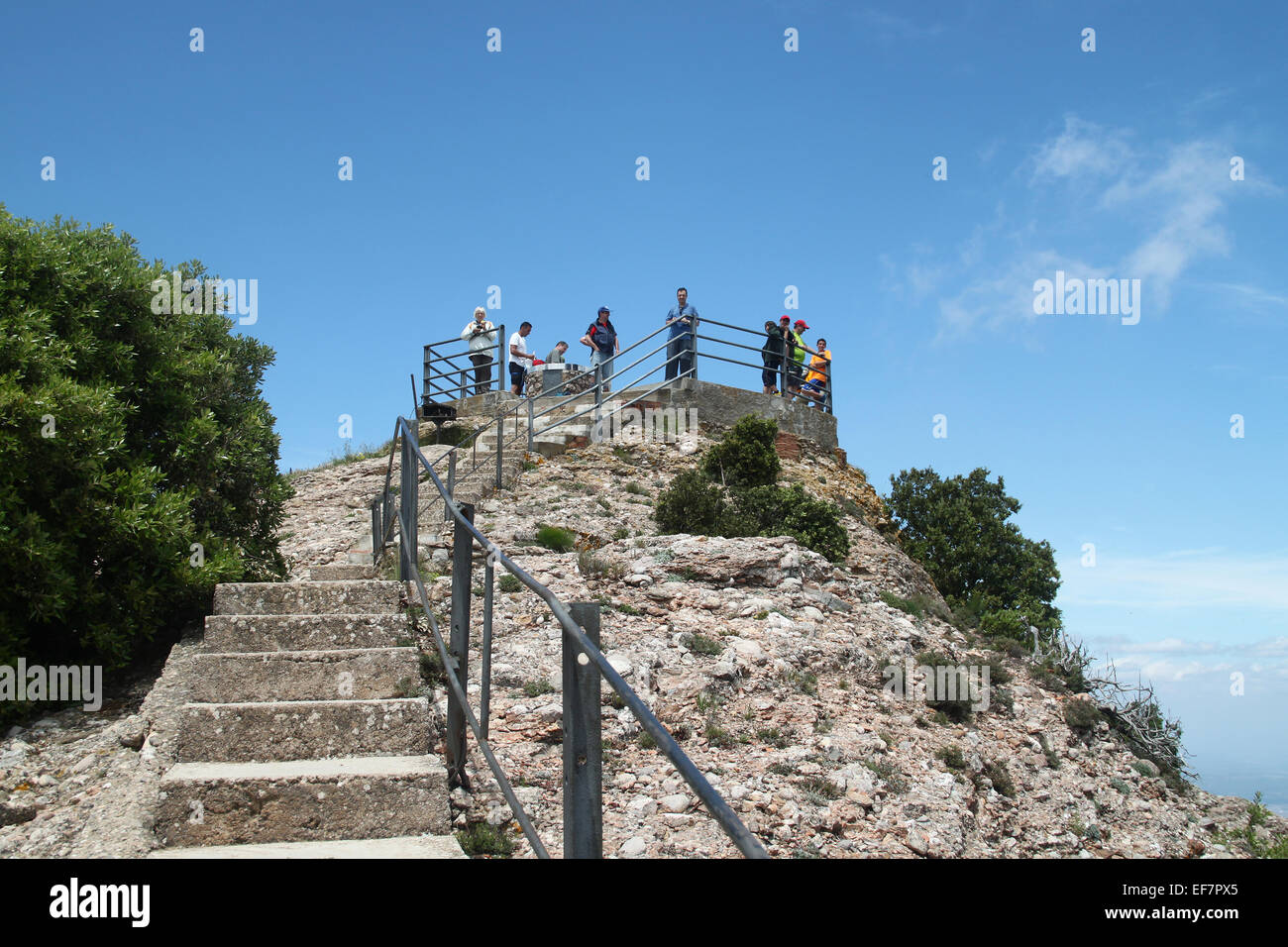 Steps with railing leading up to the peak of Sant Jeroni (1,236 m ...