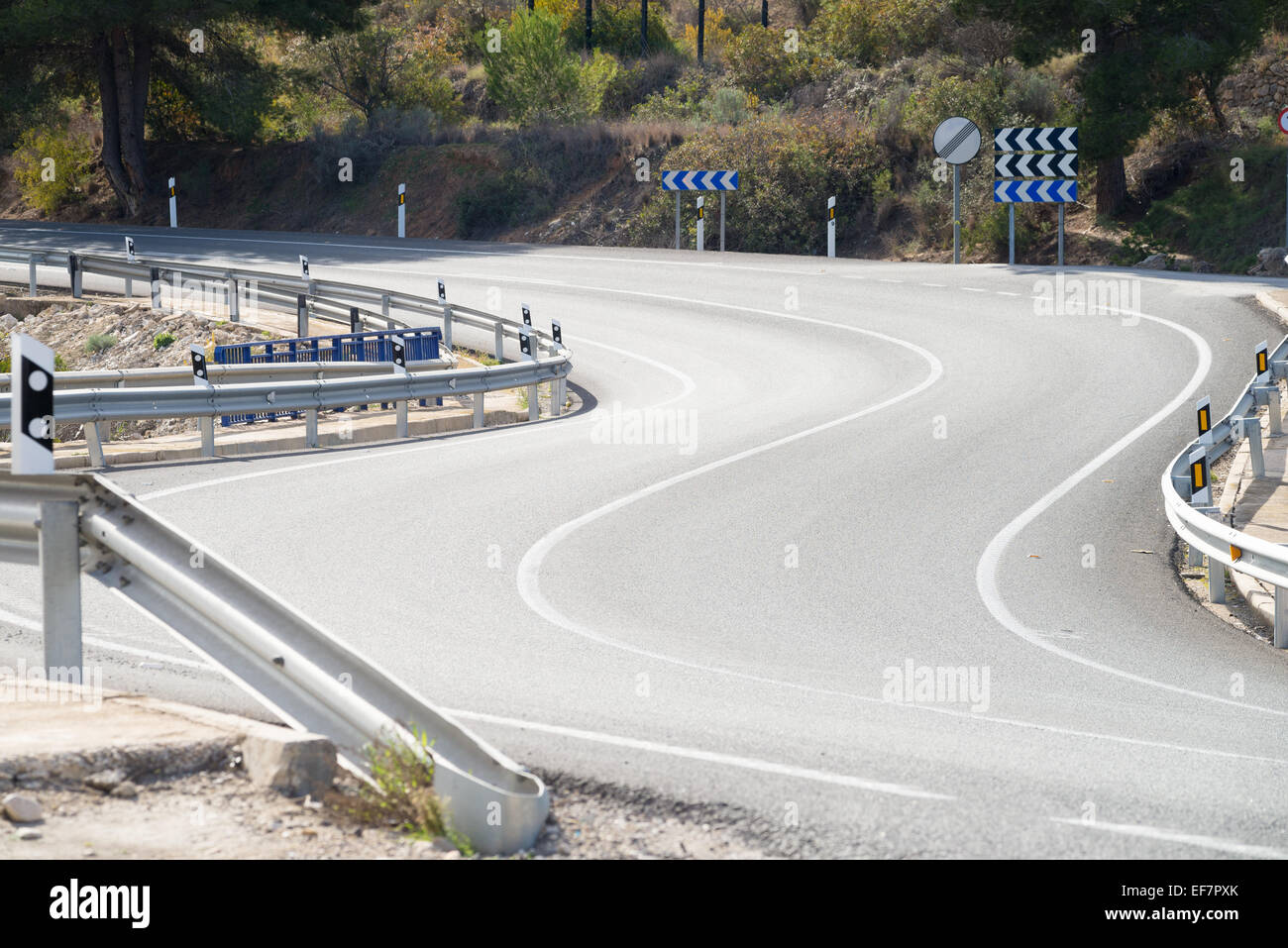 Winding road tight curve hi-res stock photography and images - Alamy