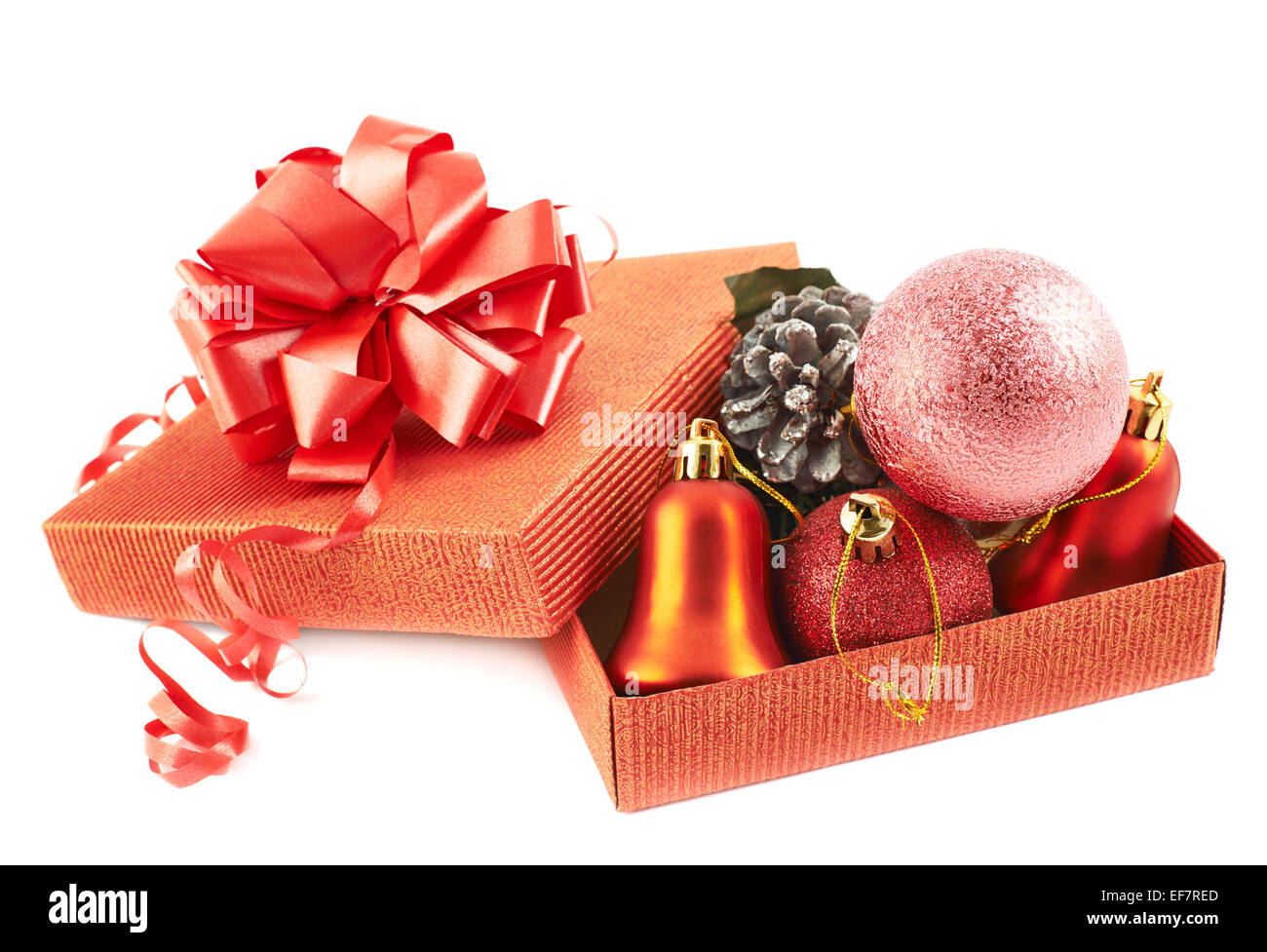 Red gift box full of decorations Stock Photo - Alamy