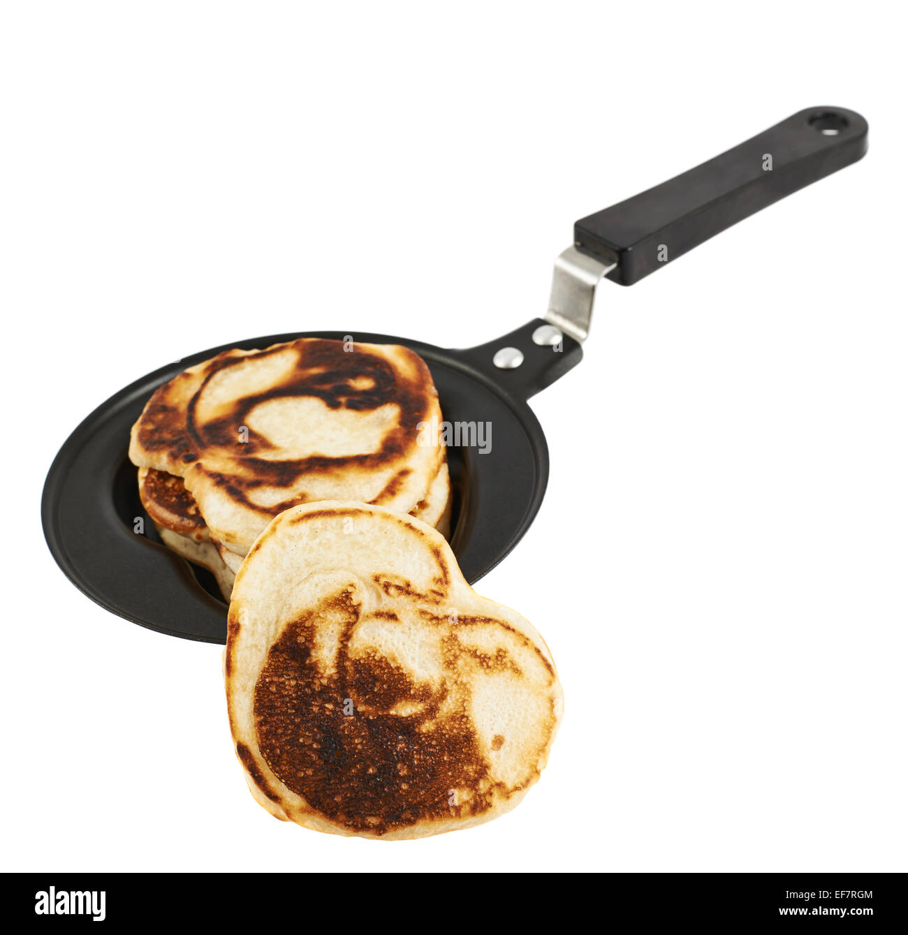 Heart shaped flapjack pancake in a pan Stock Photo - Alamy