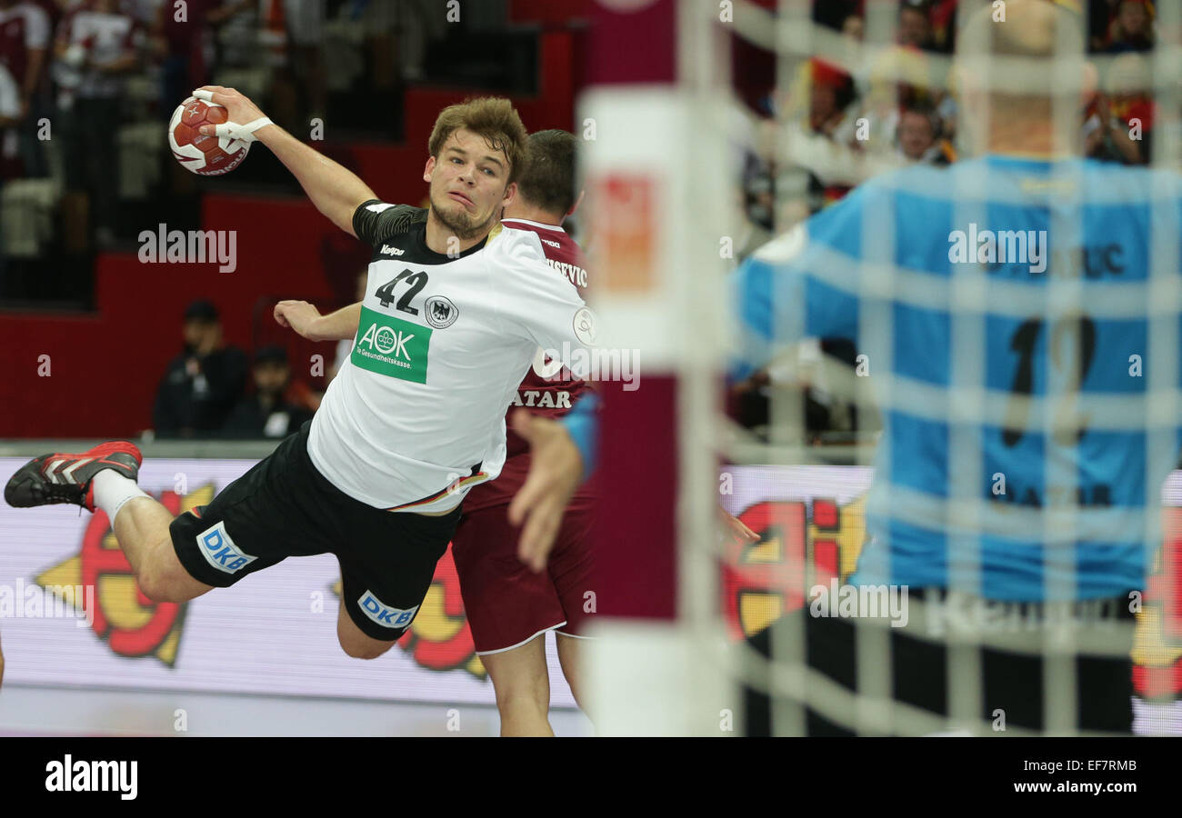 Germany's Paul Drux (L) tries to score during the men's Handball World ...