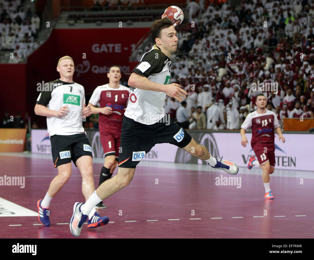 Germany's Patrick Groetzki (C) in action during the men's Handball ...