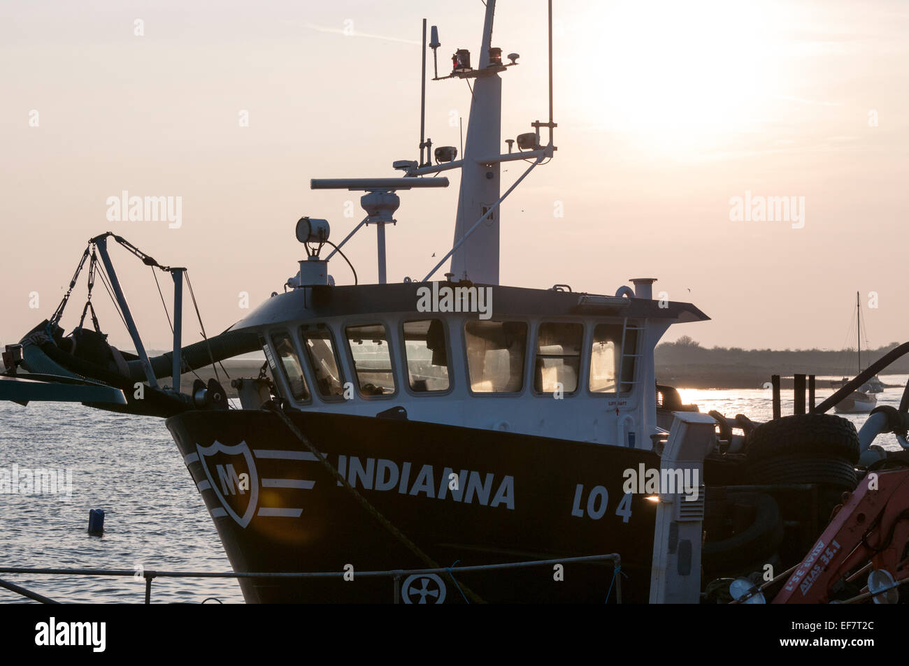 Fishing boat on a high tide in the harbour hi-res stock photography and ...