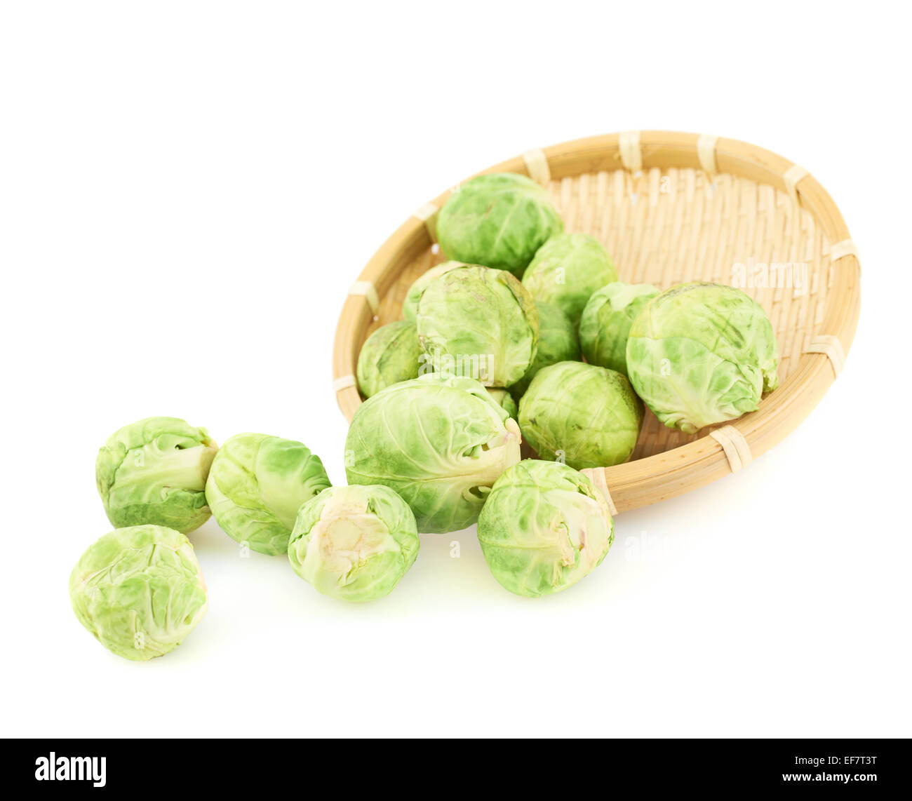 Brussels sprouts falling out of the basket Stock Photo - Alamy