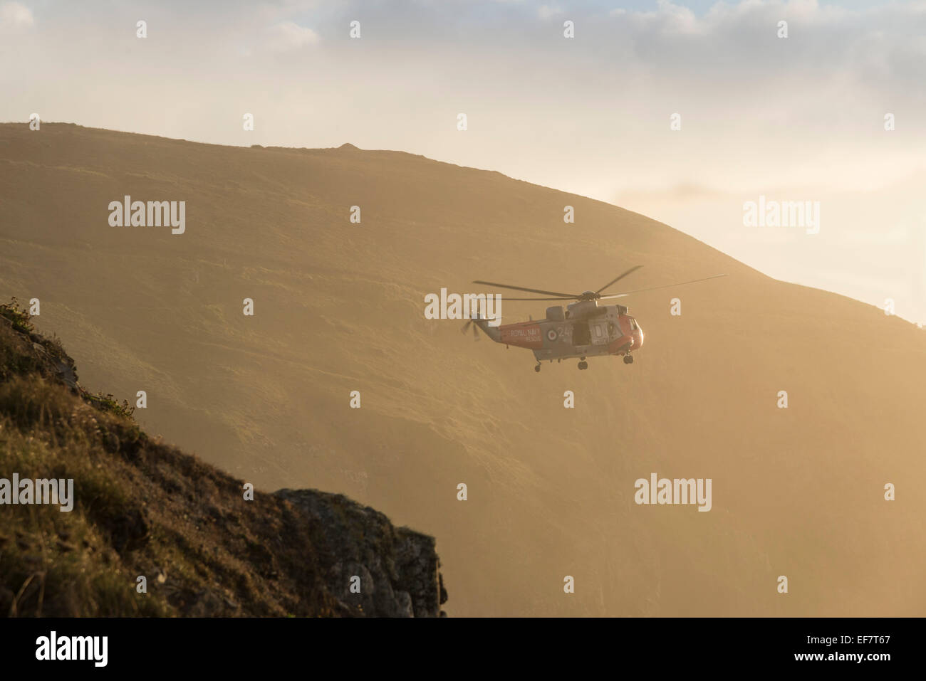 Royal Navy rescue helicopter performing successful rescue at Droskyn ...