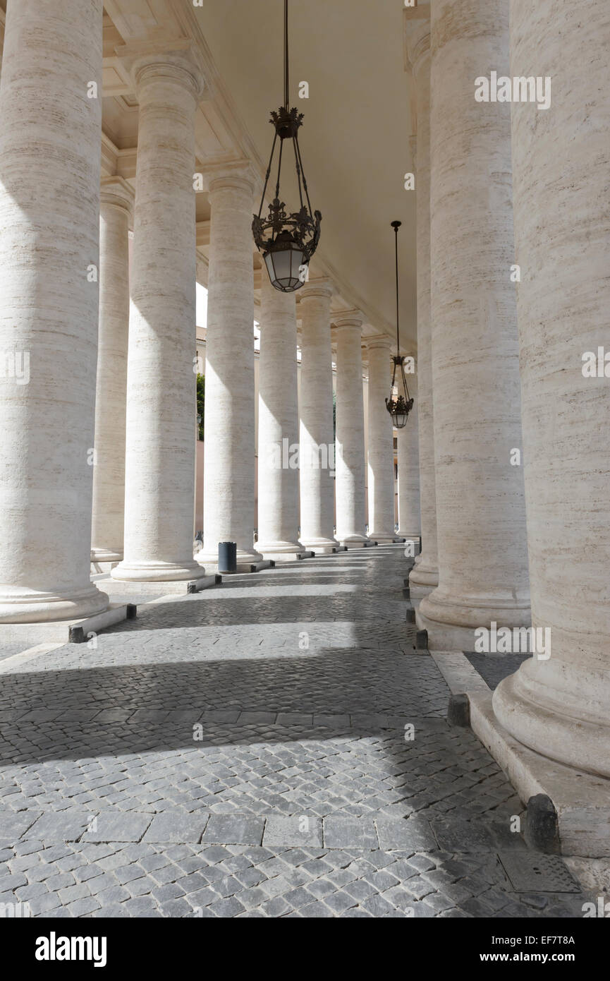 Huge white columns as part of the Colonnade around st Peter's Square ...