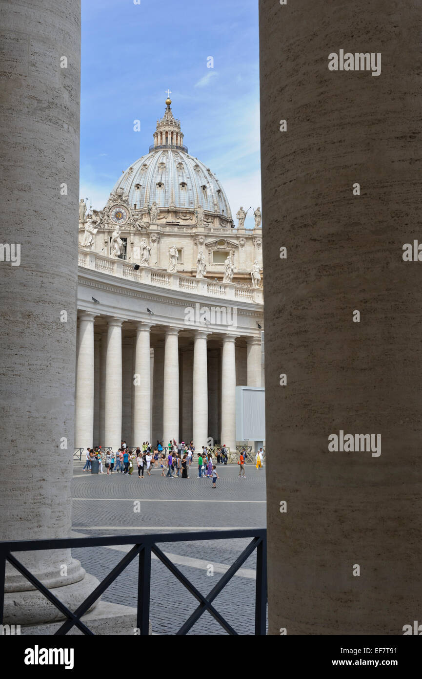 The colonnade with the dome of St Peter's Basilica in Vatican City ...