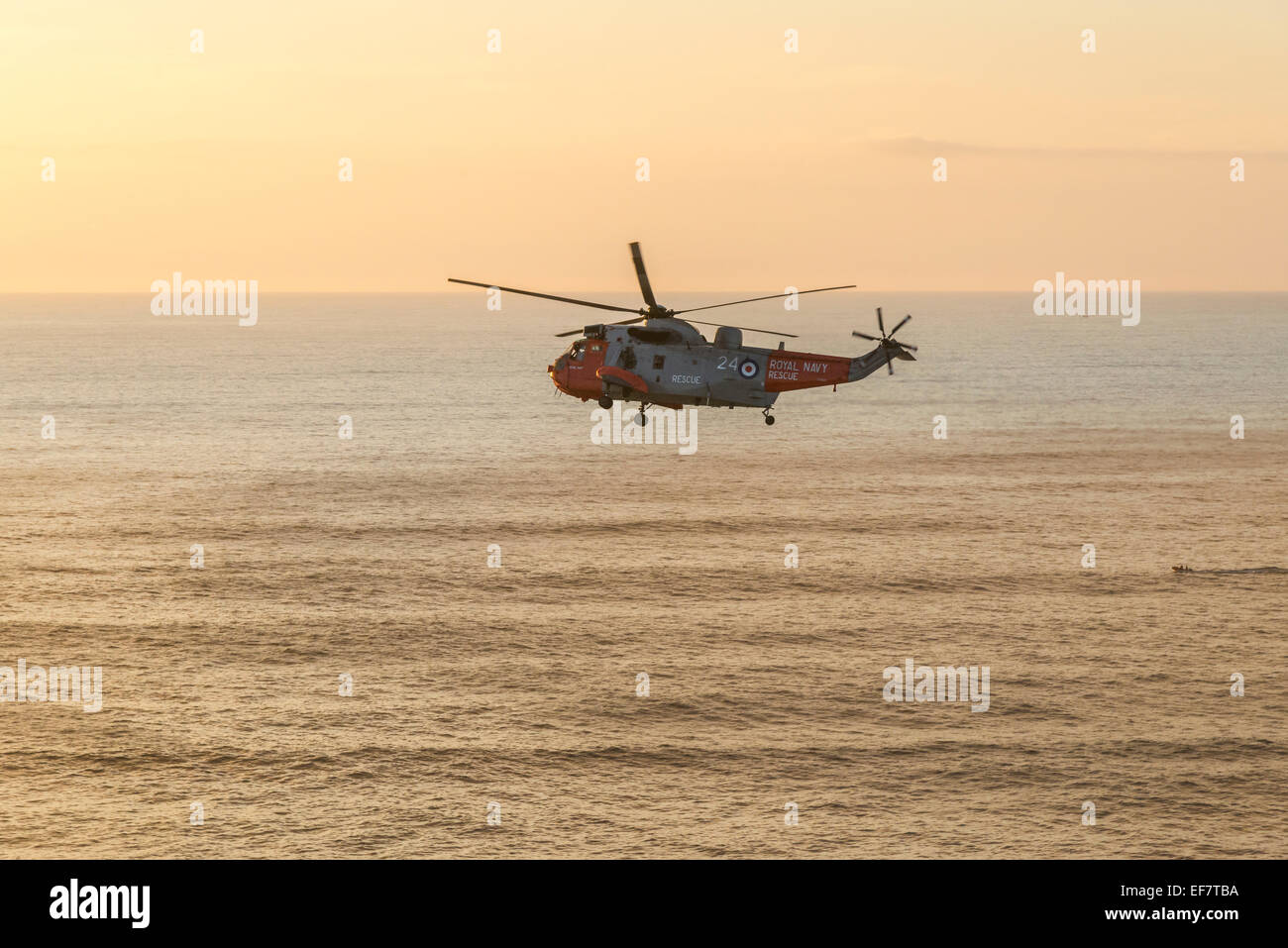 Royal Navy rescue helicopter performing successful rescue at Droskyn ...