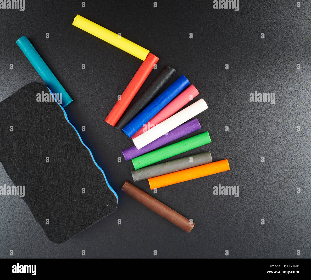 Black board with a multiple chalks Stock Photo - Alamy
