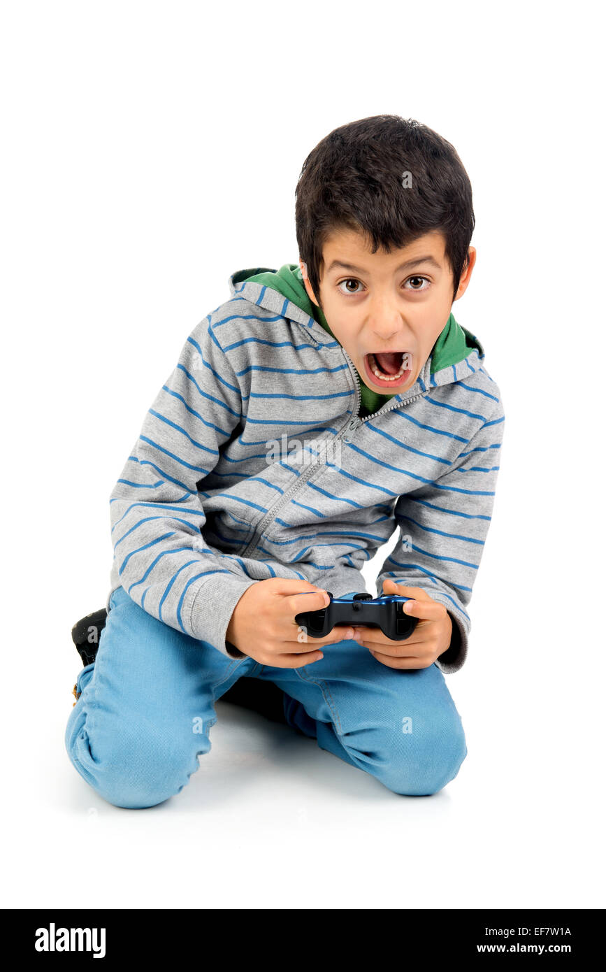 Boy playing video games making faces isolated in white Stock Photo - Alamy