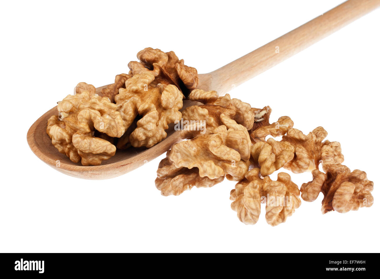 Wooden spoon with walnut, isolation on a white background Stock Photo ...