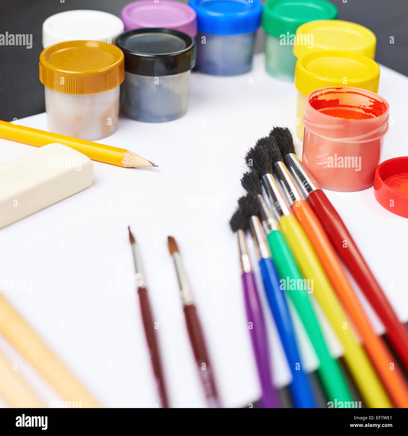 Multiple drawing paints and brushes Stock Photo - Alamy