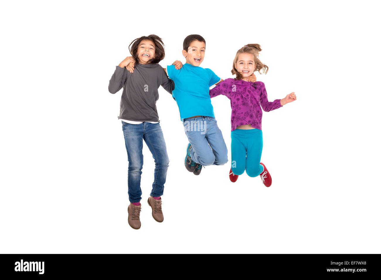 Group of children jumping isolated in white Stock Photo - Alamy