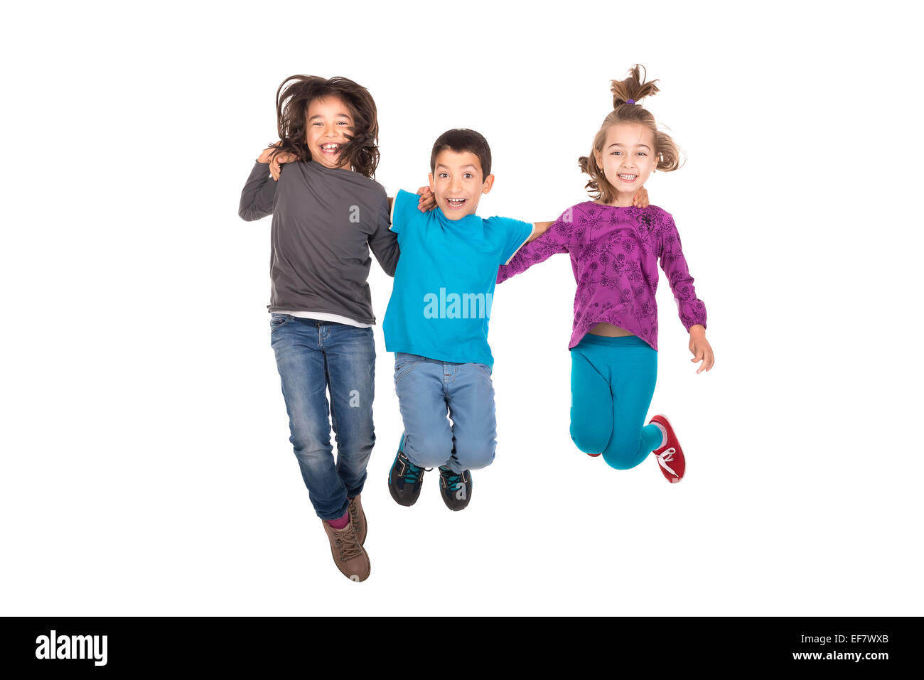 Group of children jumping isolated in white Stock Photo - Alamy