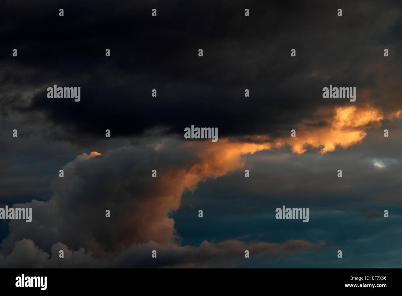 Evening clouds after summer storm and just before sunset Stock Photo - Alamy