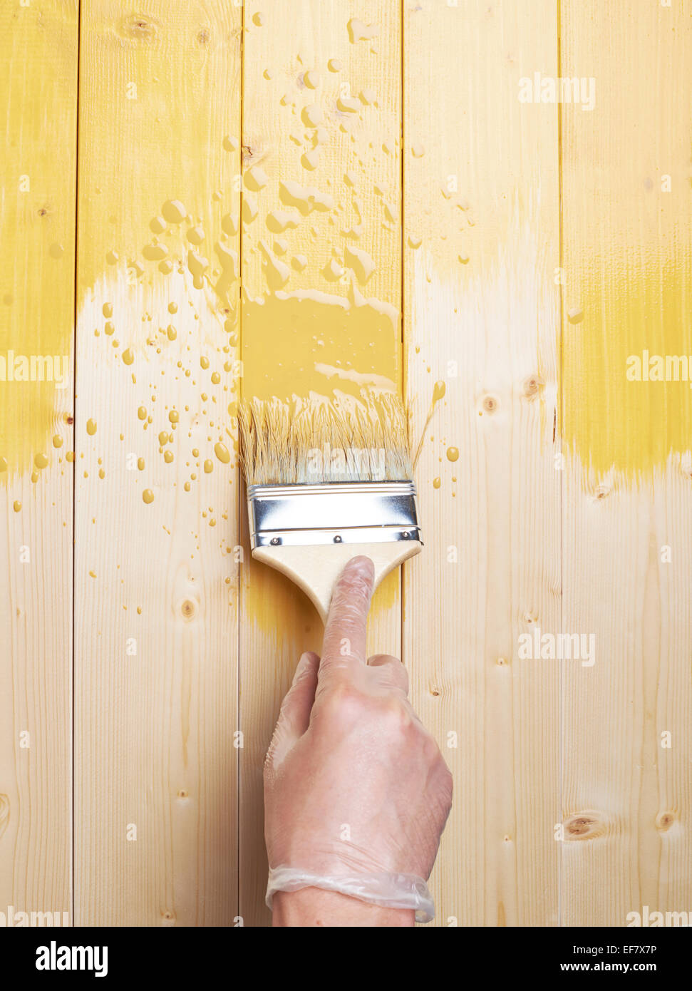Process of painting wooden boards Stock Photo - Alamy