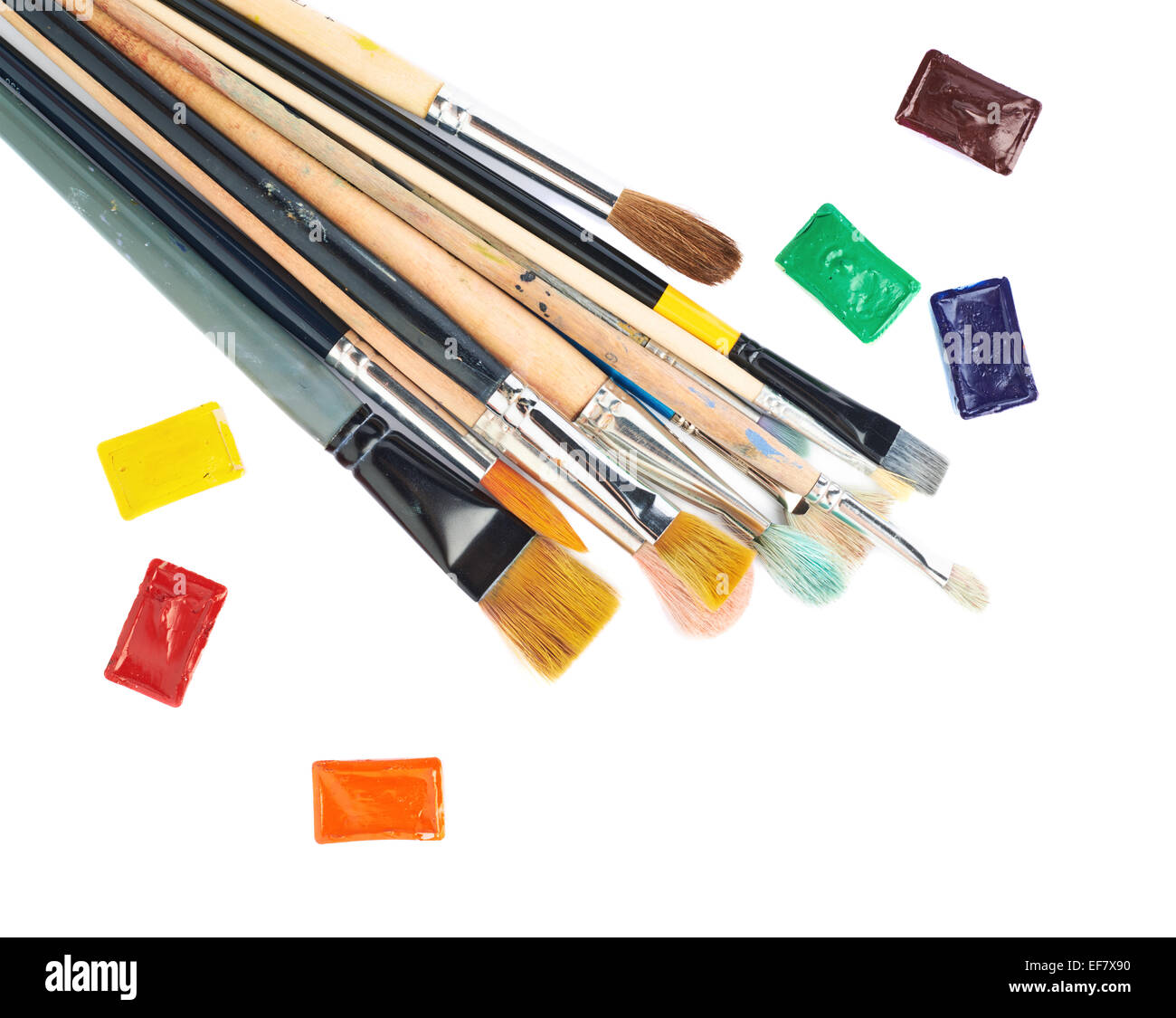 Multiple brushes next to a paint cases Stock Photo - Alamy