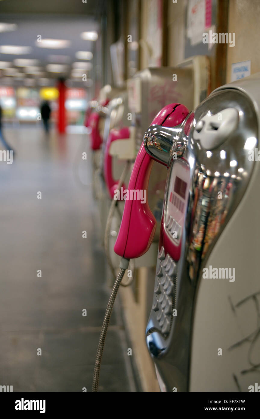 public phone with pink receiver Stock Photo - Alamy