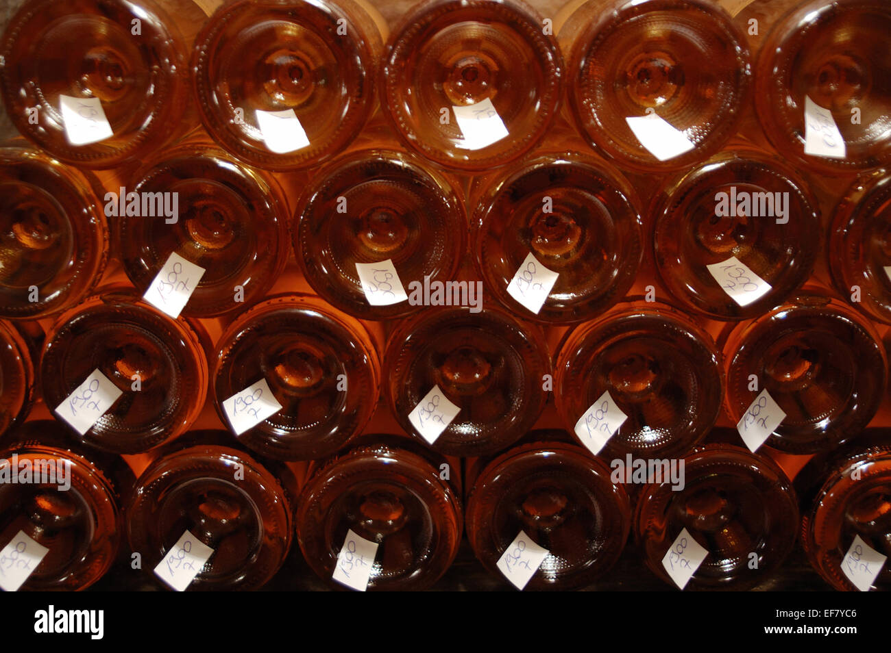 stack of bottles bottom side forward Stock Photo - Alamy