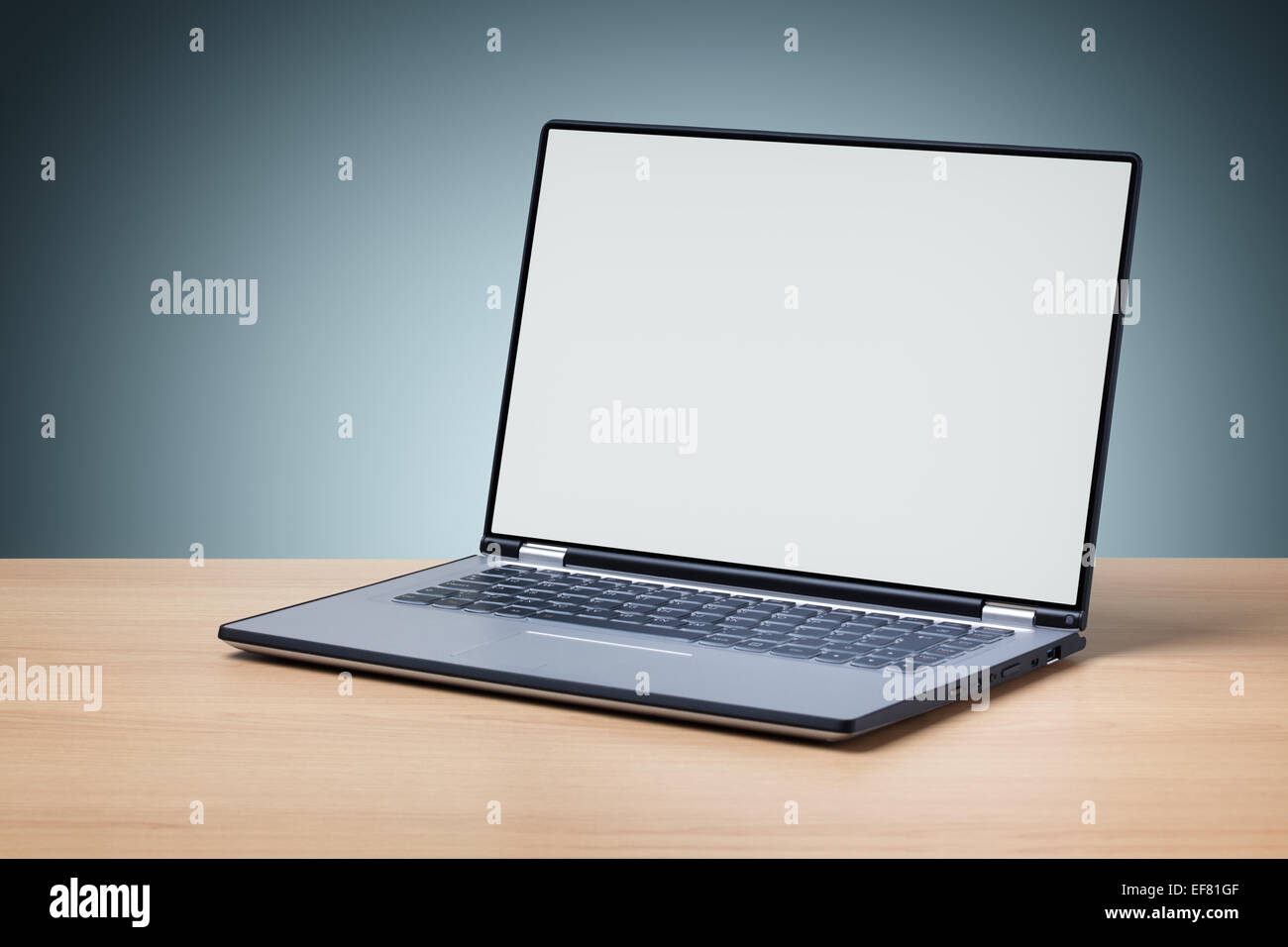 Laptop on desk with blank screen for copy or web page Stock Photo - Alamy