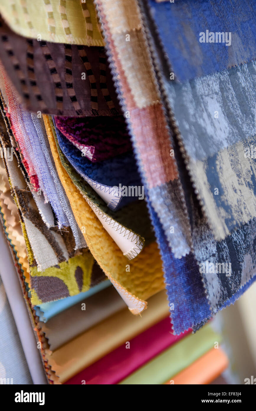Fabric samples hanging together in a sample book Stock Photo - Alamy