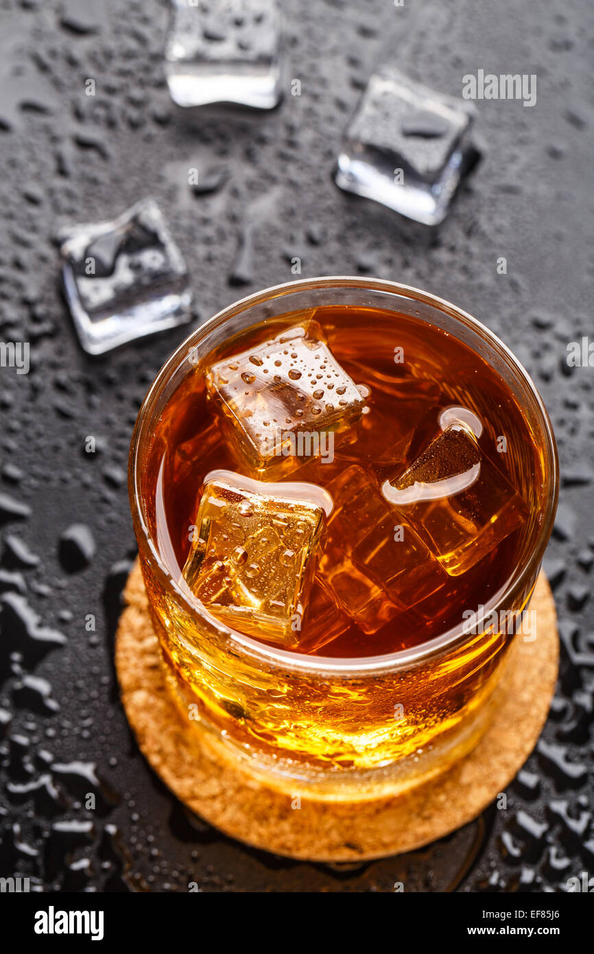 Glass with alcoholic drink Stock Photo - Alamy